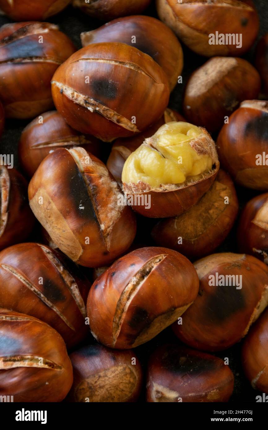 Roasted chestnuts ready to eat hi-res stock photography and images - Alamy