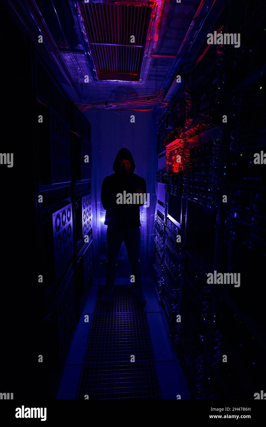 Male hacker dressed in hi-res stock photography and images - Alamy