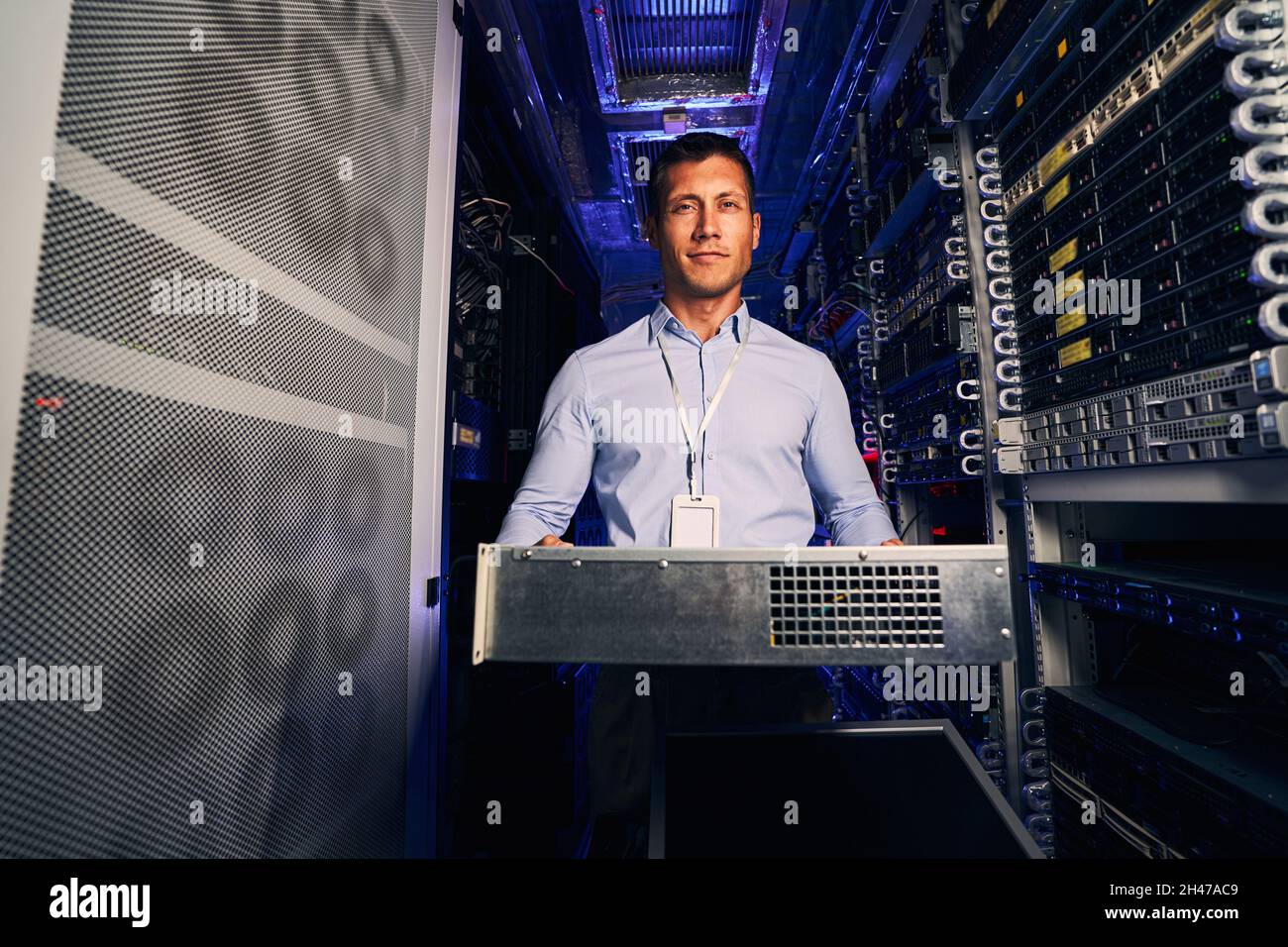 Tranquil data center engineer installing new hardware component Stock ...