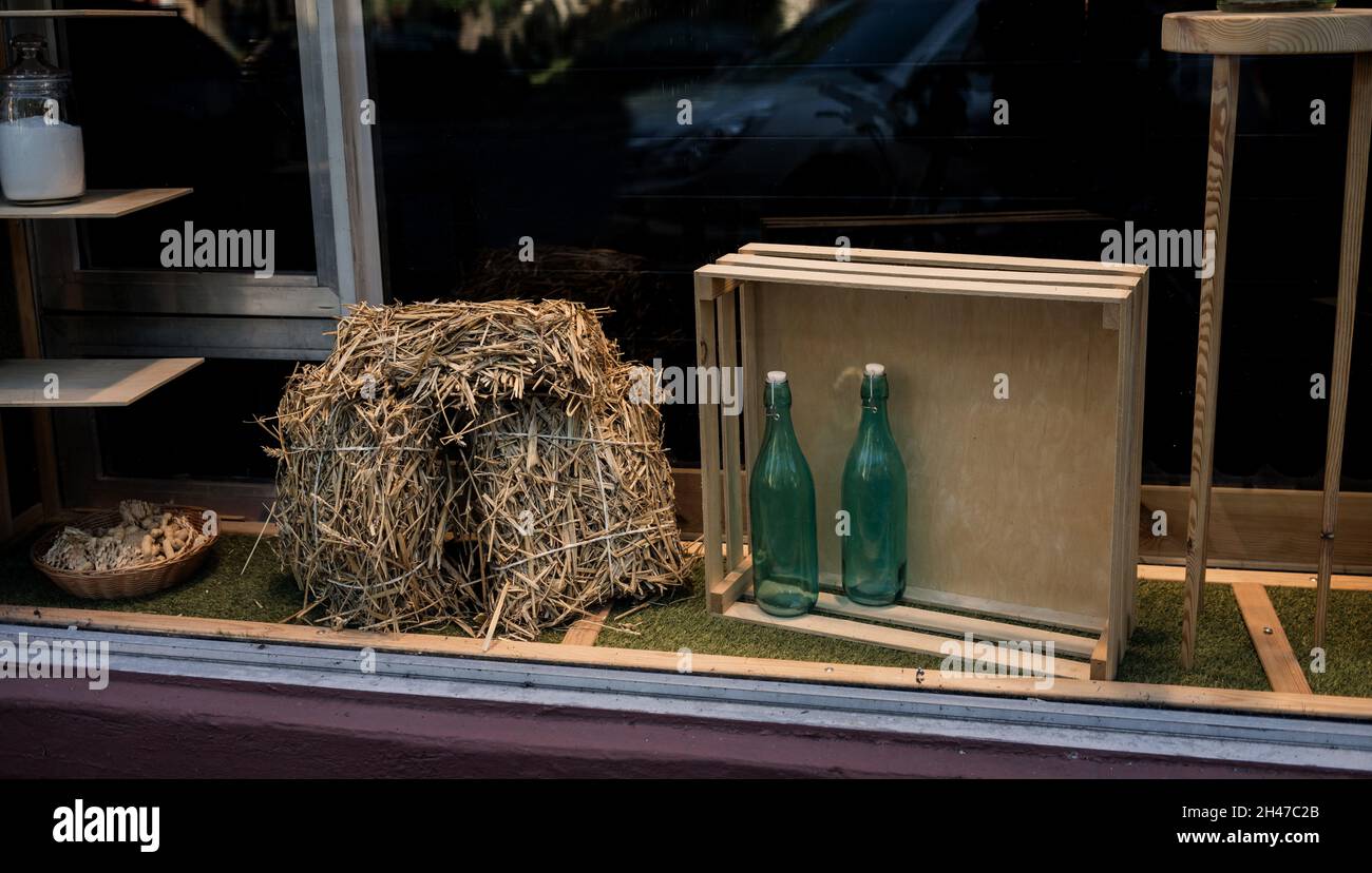 hay as a decor. rustic style. decoration of a grocery store window ...
