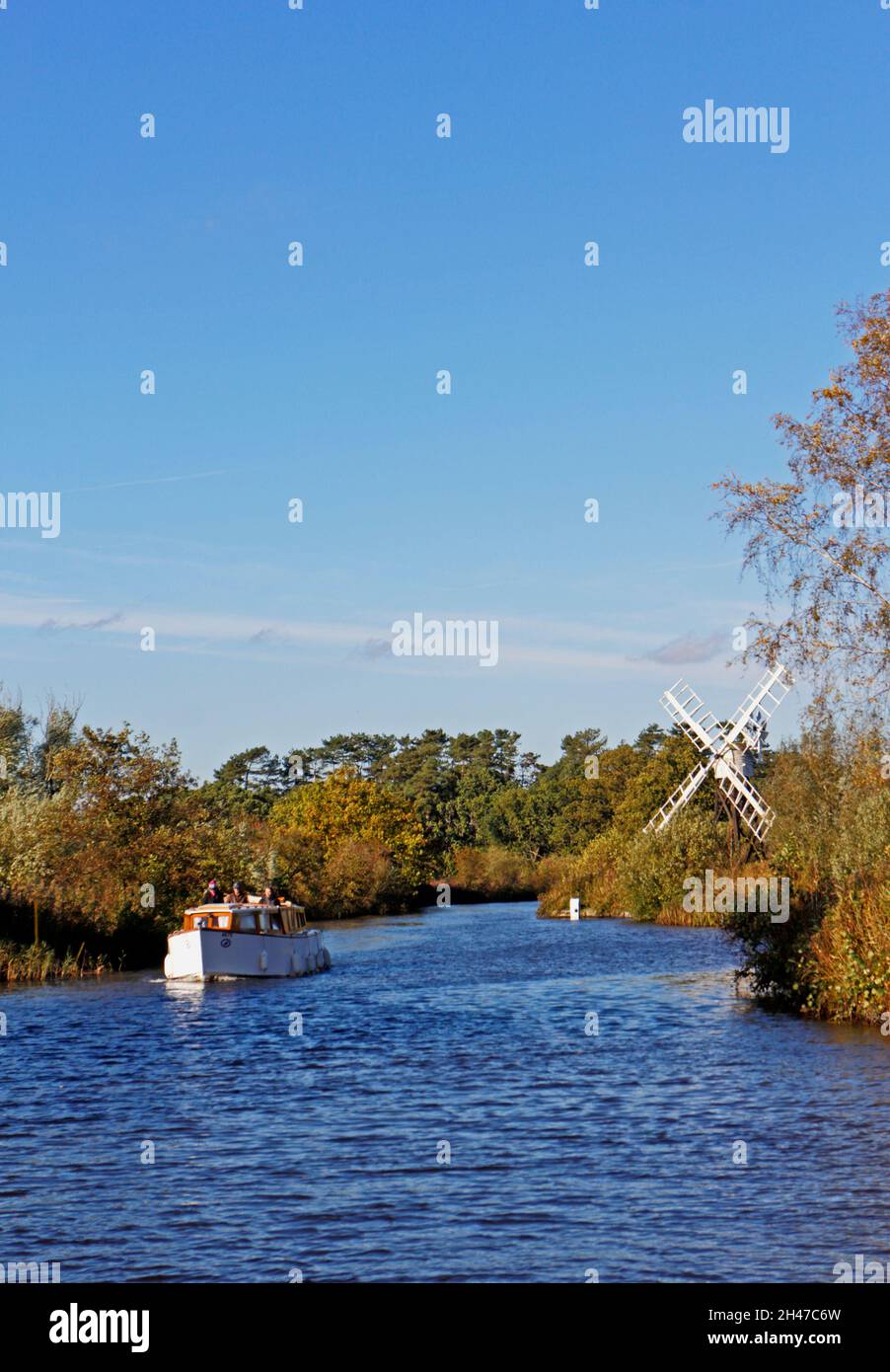 A view of the River Ant in autumn by How Hill on the Norfolk Broads at ...