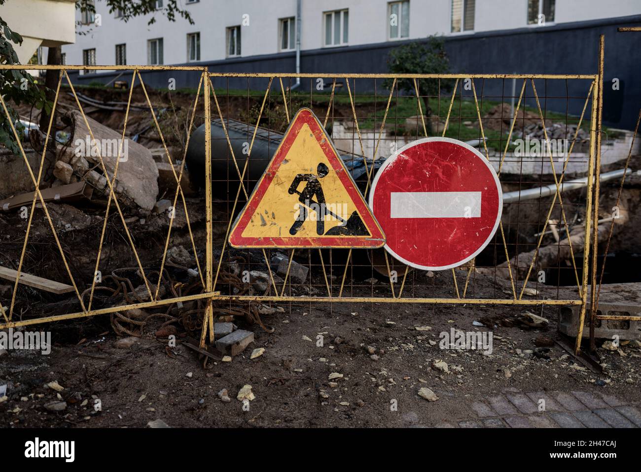 Stop sign and road work sign inform that road is closed. Road ...