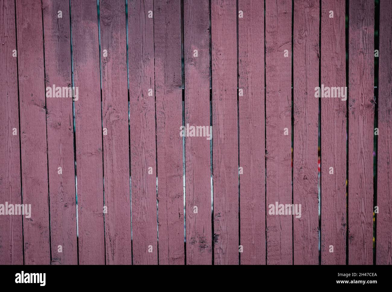 Wooden fence with vertical boards. Background and texture of a homemade ...
