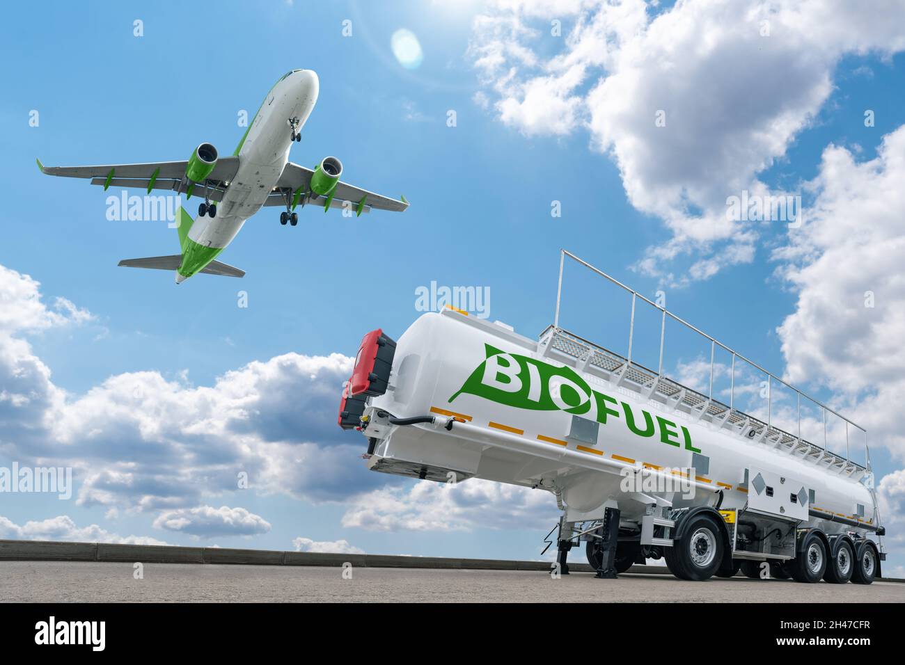 Airplane and biofuel tank. Decarbonization concept Stock Photo - Alamy