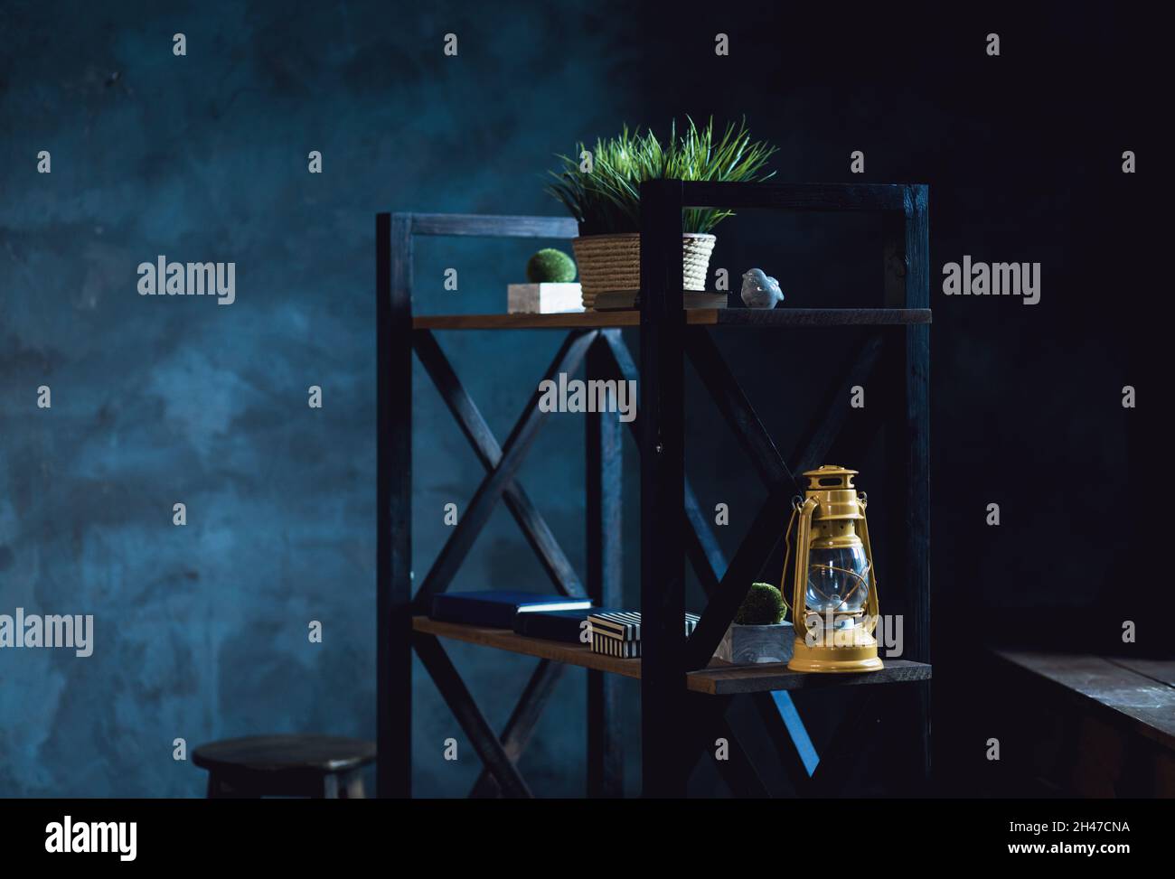 contemporary loft interior with shelves full of decor objects on the ...