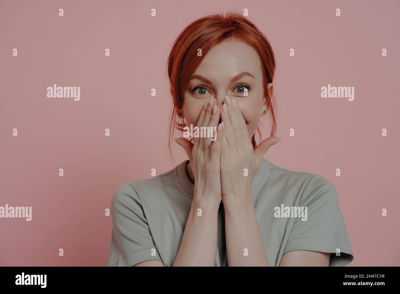 Woman covering face shock hi-res stock photography and images - Alamy
