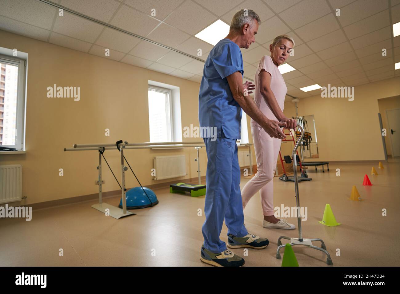 Stroke patient restoring movement skills in rehab center Stock Photo ...