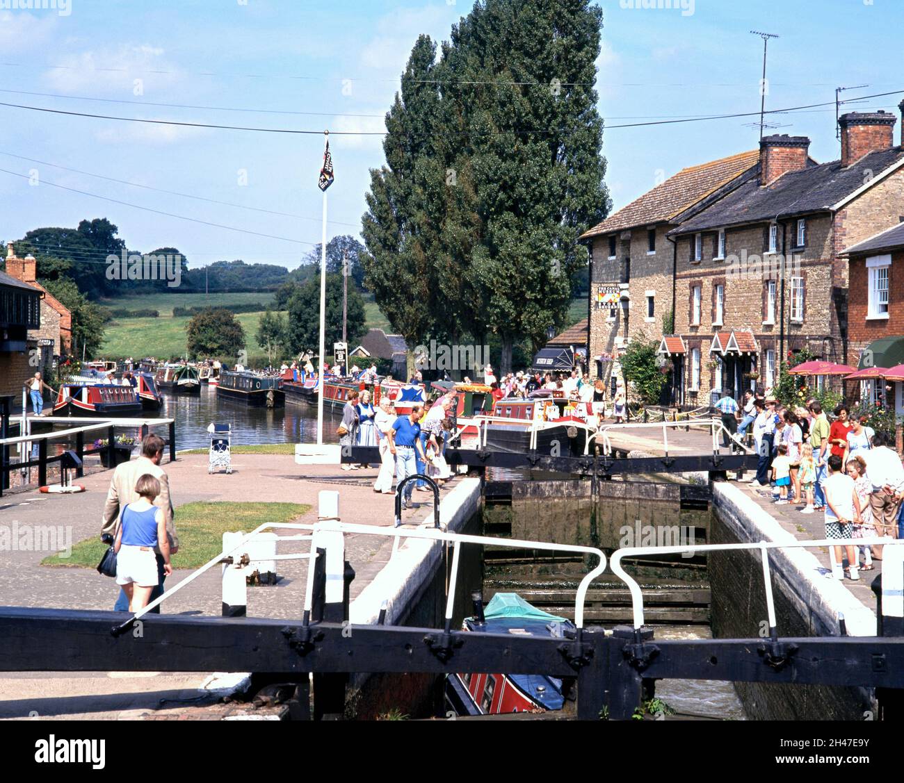 Narrowboat passing through locks hi-res stock photography and images ...