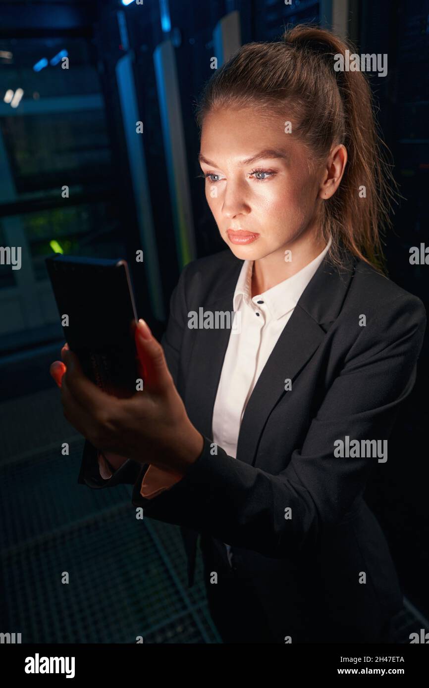 Attractive engineer working in data hi-res stock photography and images - Alamy