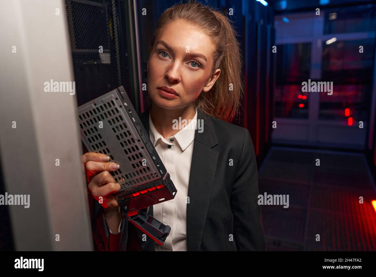 Female IT engineer in server room at modern data center Stock Photo - Alamy