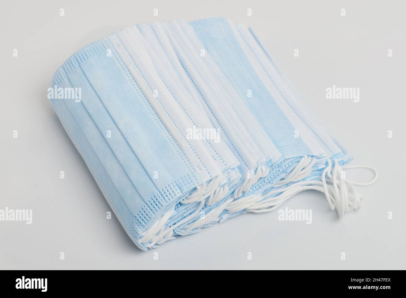 Group of new clean face mask isolated on studio background Stock Photo ...