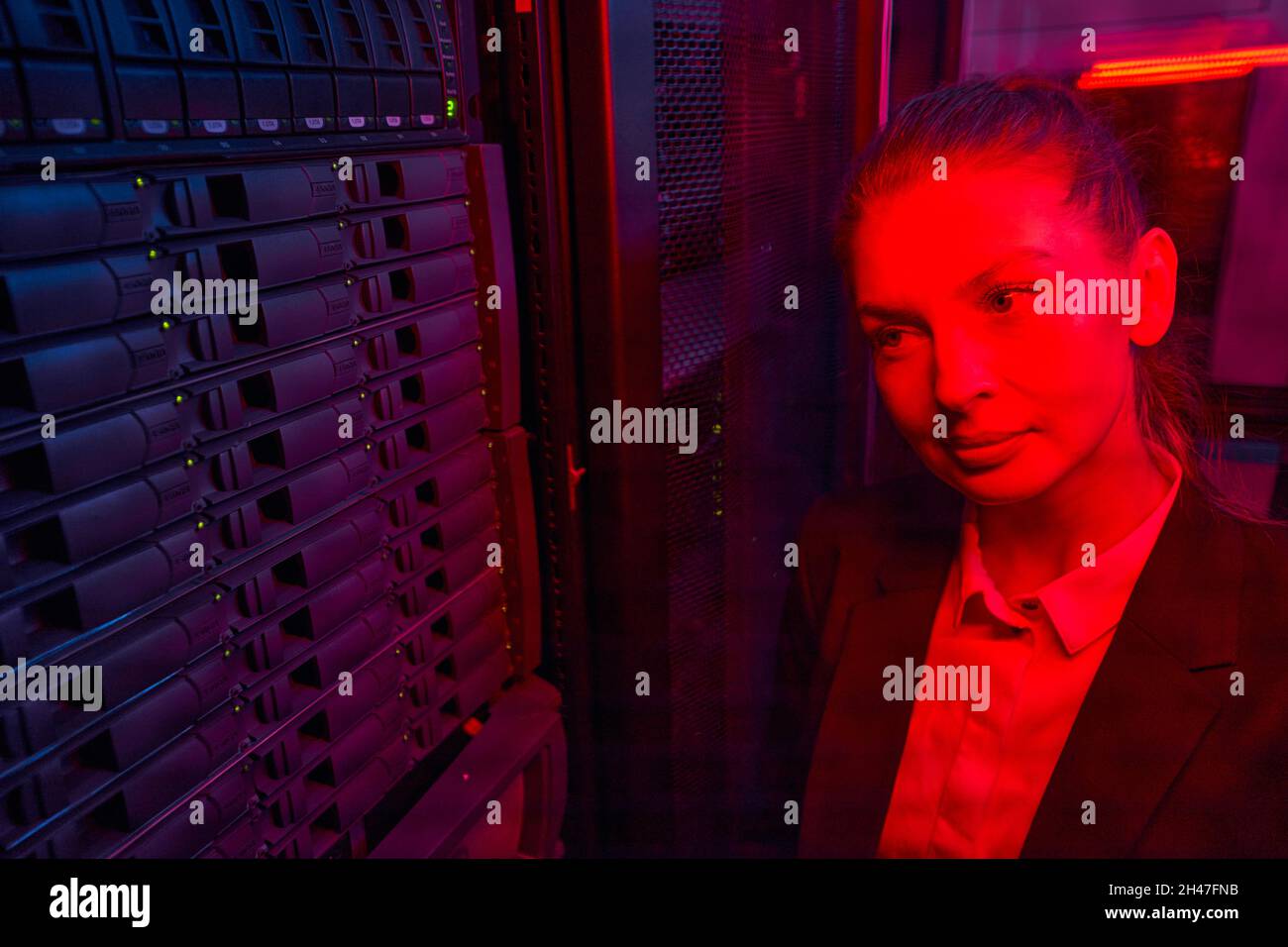 Businesswoman working with supercomputer at server room Stock Photo - Alamy