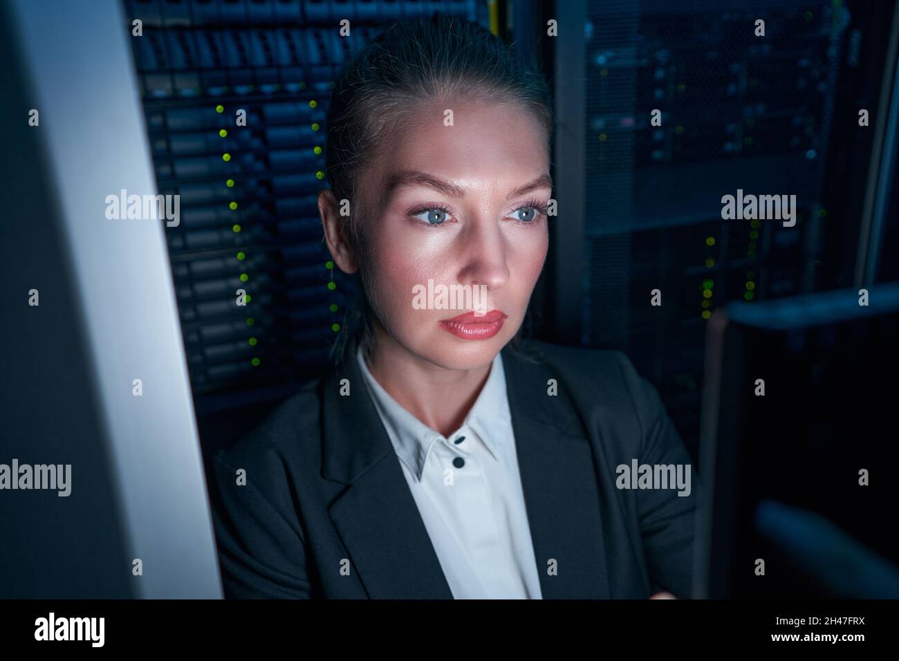 System administrator working on cyber security in data center Stock ...