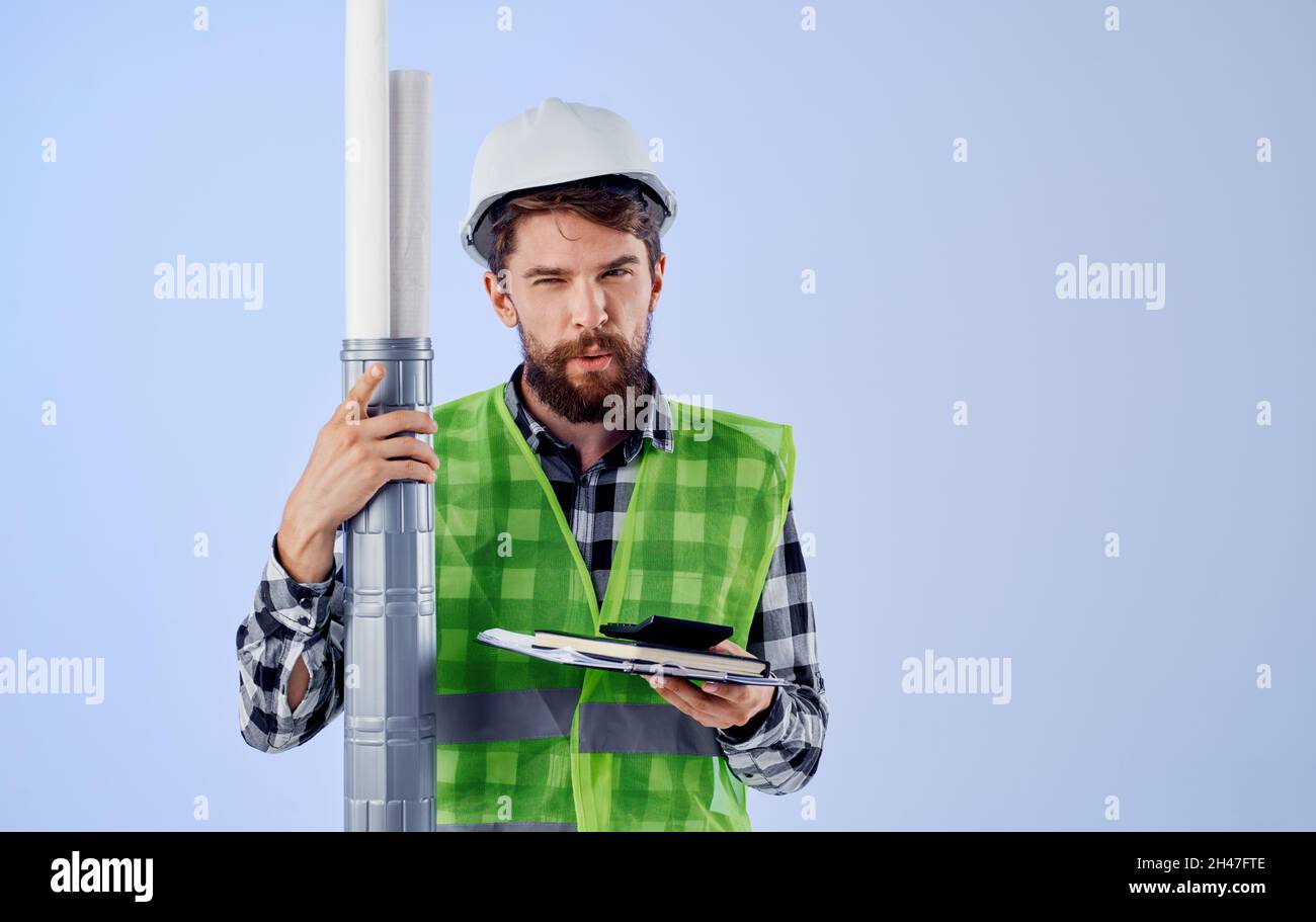 engineer in a white helmet blueprints Professional isolated background ...