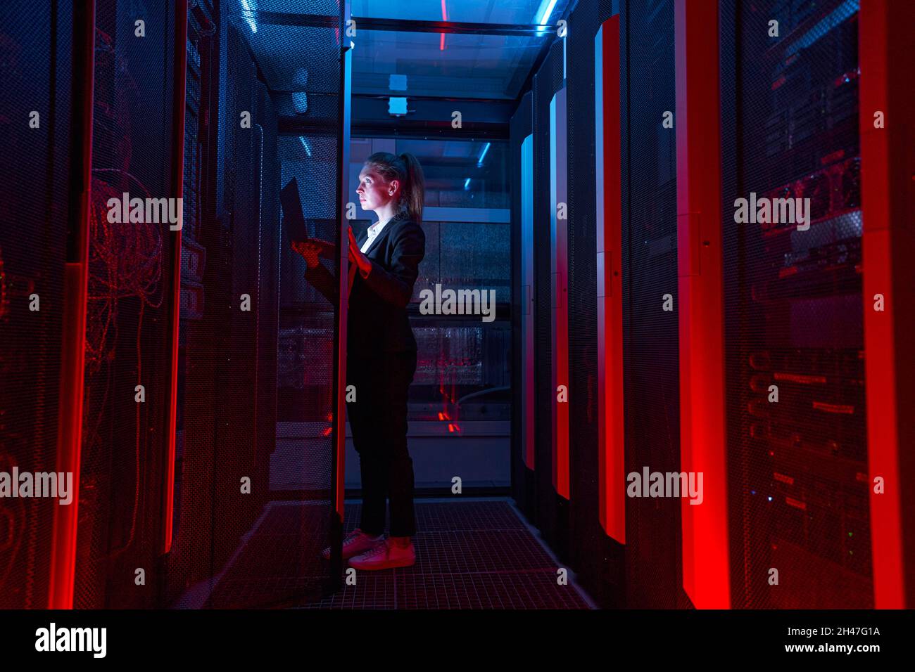 Technician works in computer server hi-res stock photography and images ...