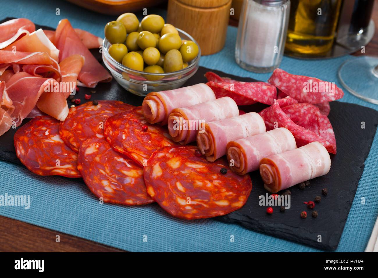 Cold smoked meat plate with traditional Spanish chorizo, fuet and ...