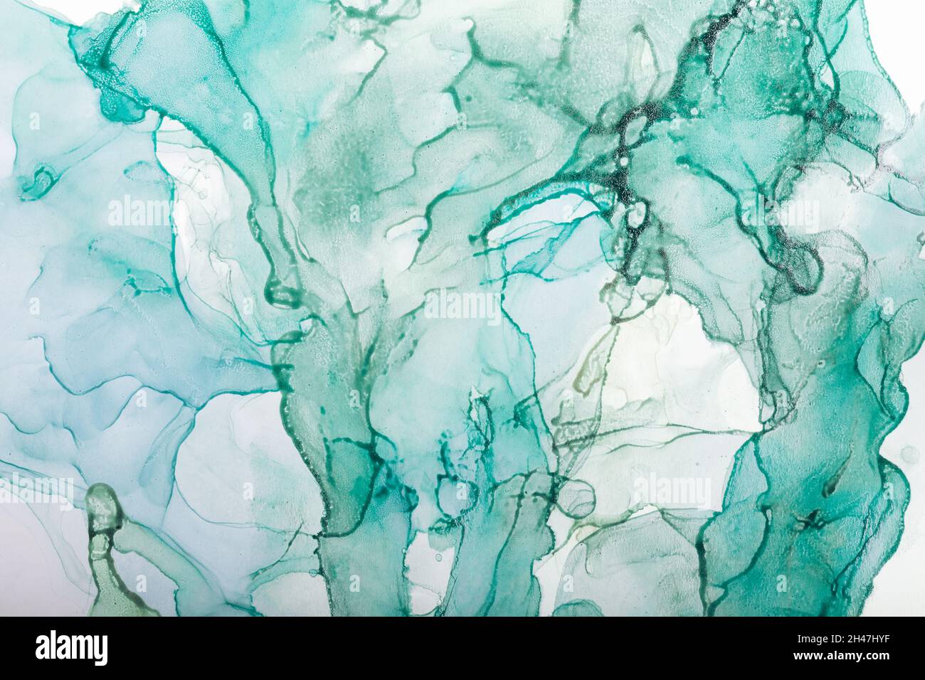 Watercolor alcohol ink swirls. Transparent waves in turquoise green ...