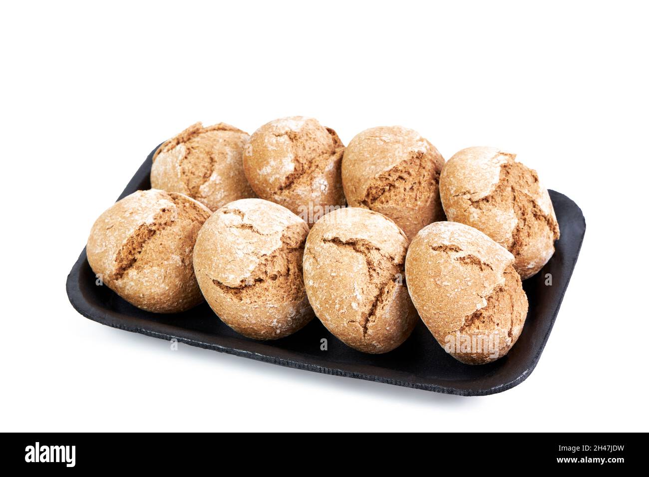 Six rye bread rolls isolated on black tray on white background. Healthy ...