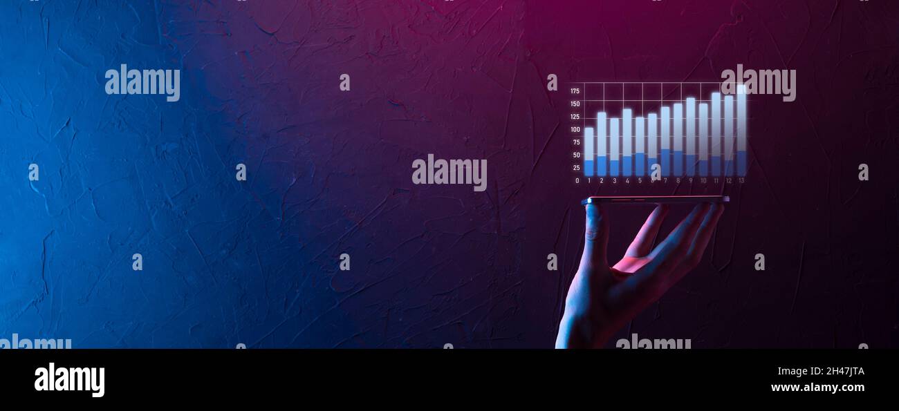 Businessman holding graph growth and increase of chart positive ...