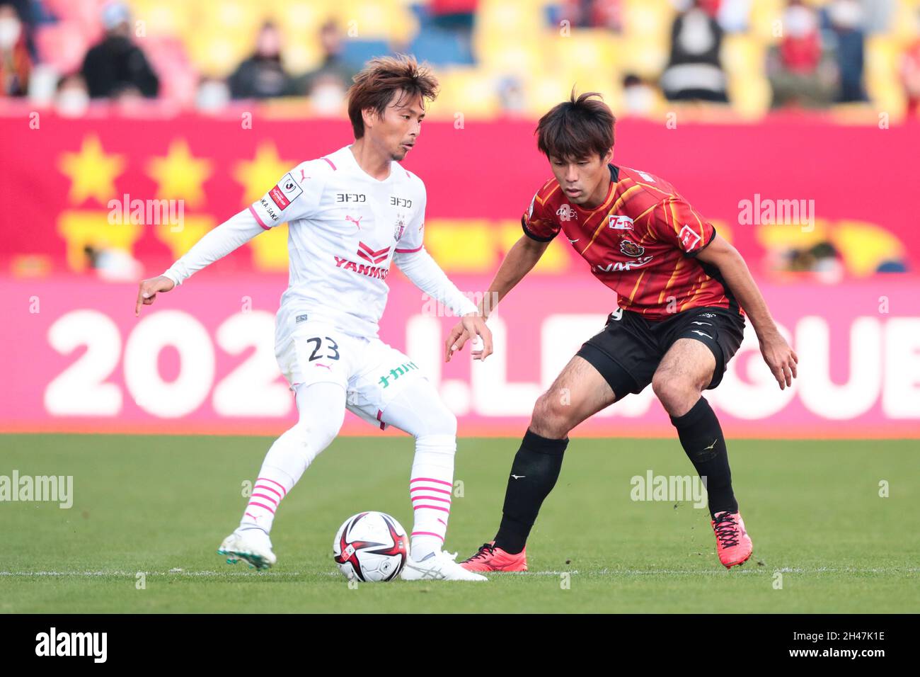 Saitama, Japan. 30th Oct, 2021. (L to R) Takashi Inui (Cerezo), Yasuki ...