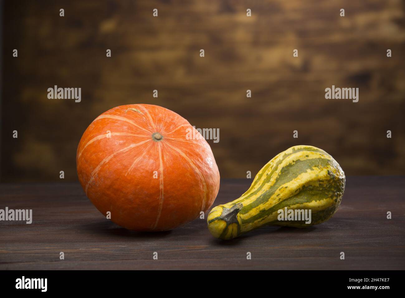 pumpkin on a wood background Stock Photo - Alamy