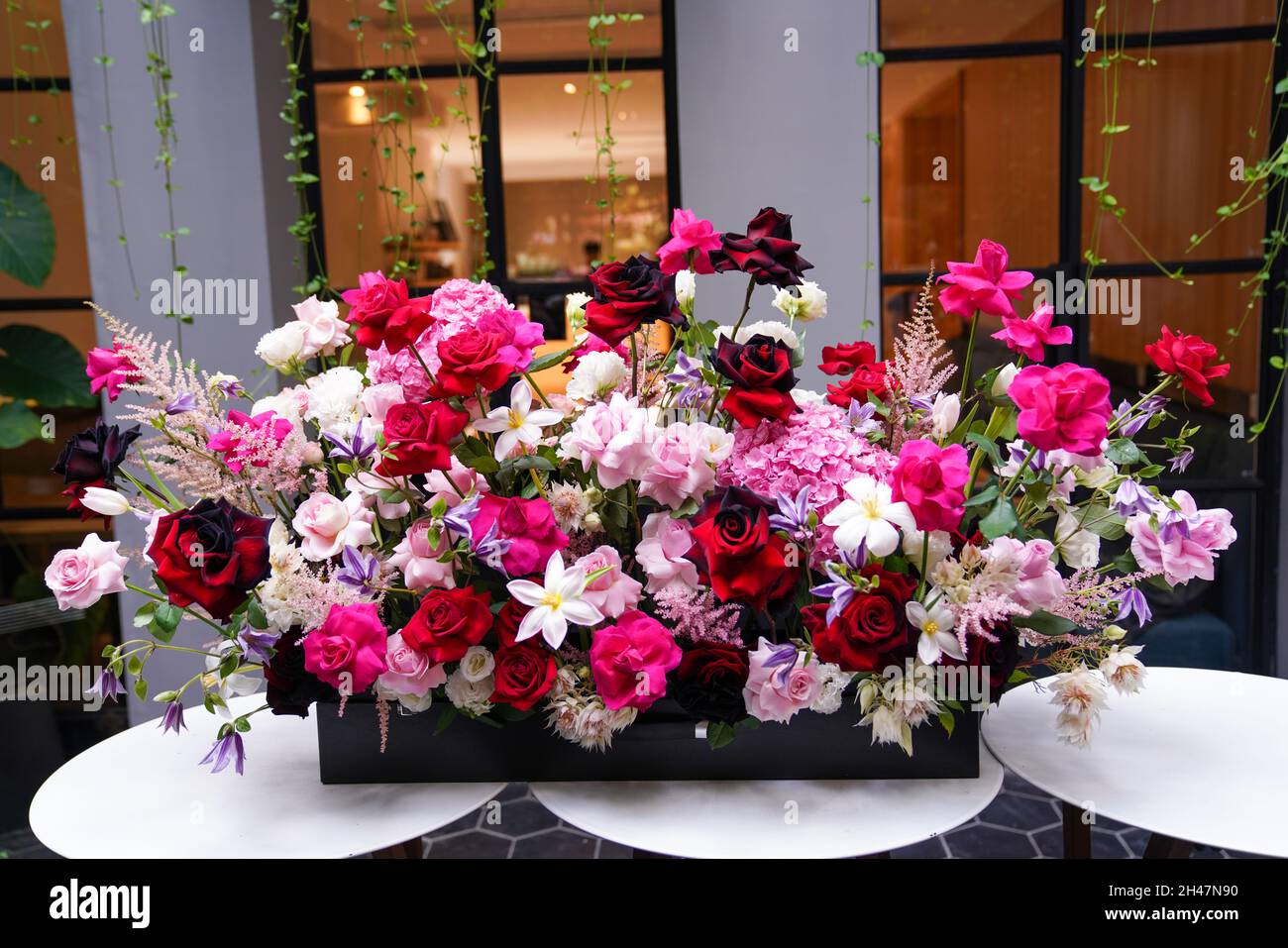 Creative layout of flowers and leaves. The concept of nature. A card ...