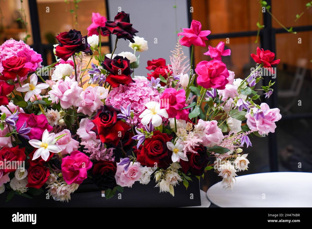 Creative layout of flowers and leaves. The concept of nature. A card ...