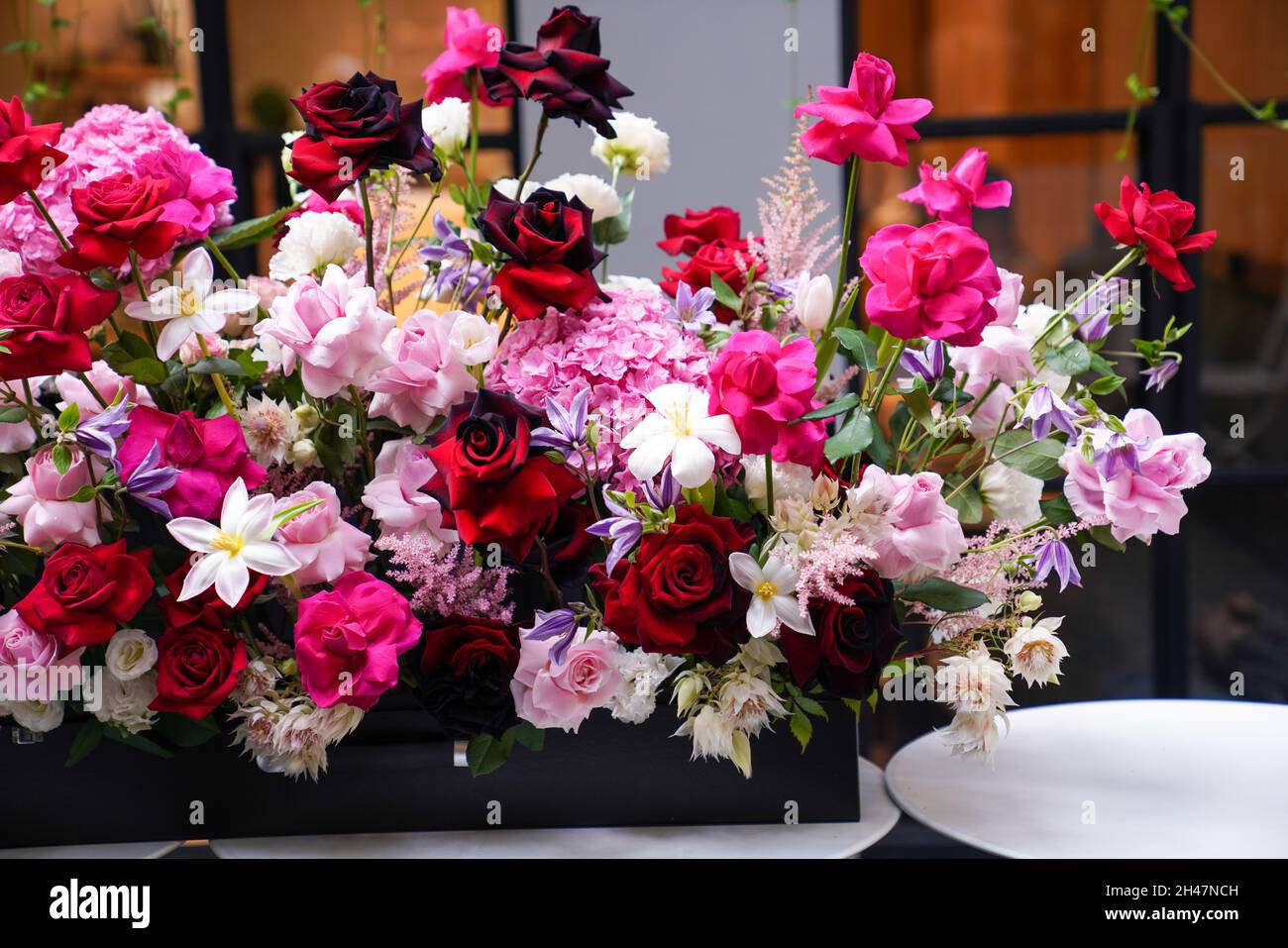 Creative layout of flowers and leaves. The concept of nature. A card ...