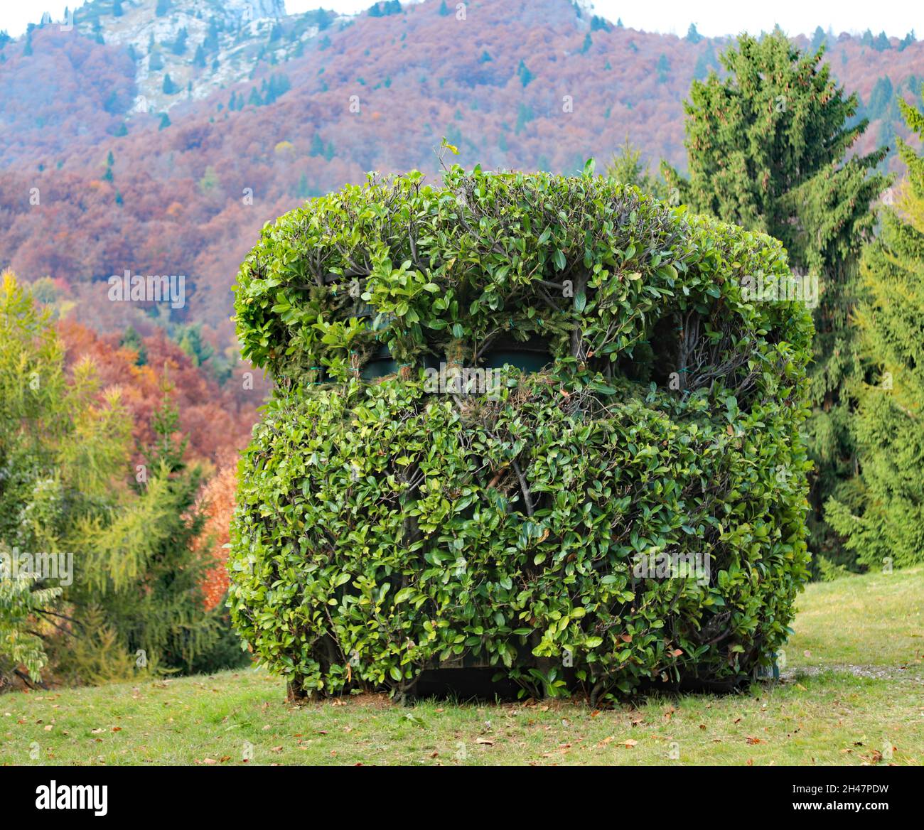 hunting lodge of hunters perfectly camouflaged with green leaves to ...