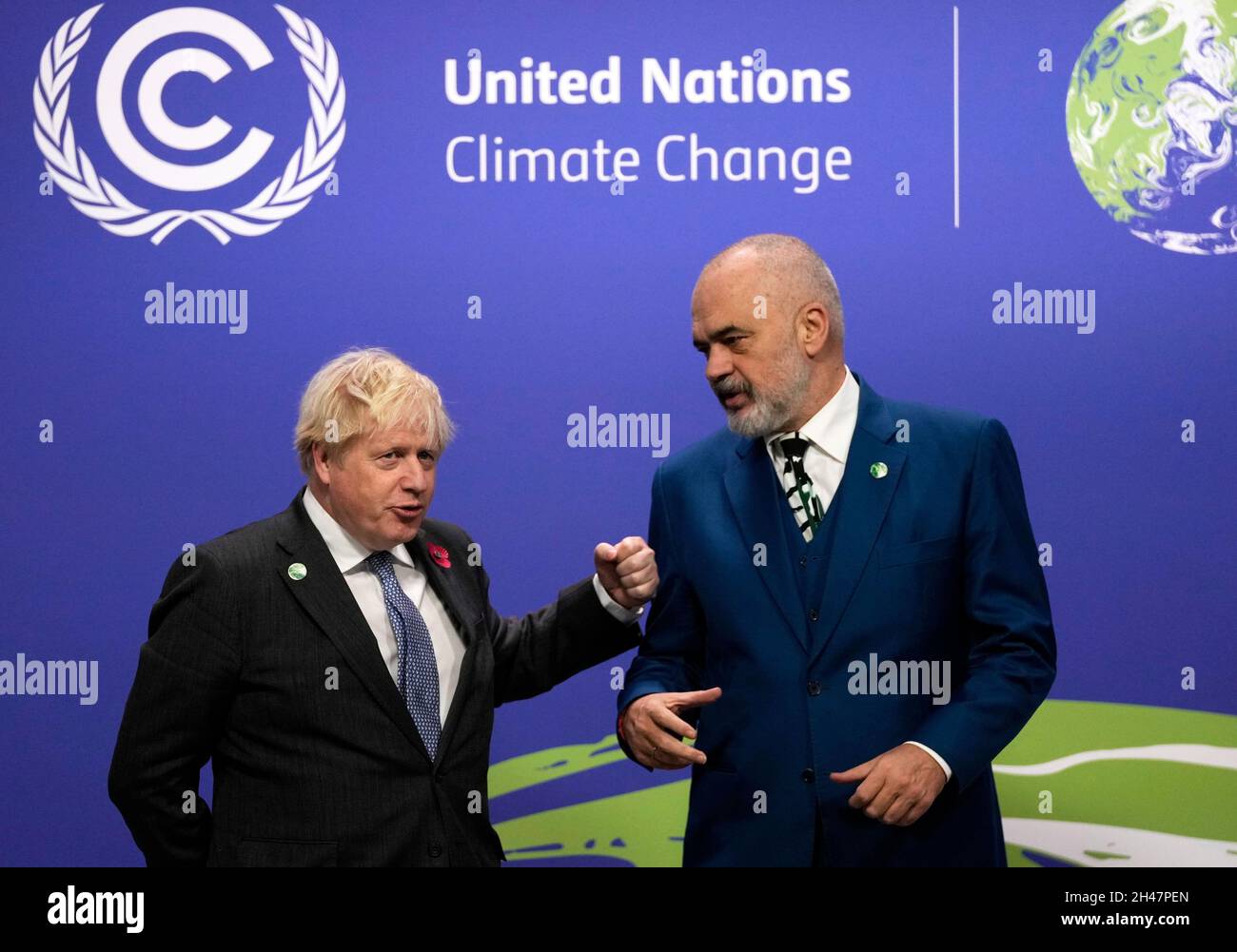 Prime Minister Boris Johnson (left) greets Morocco's Prime Minister ...