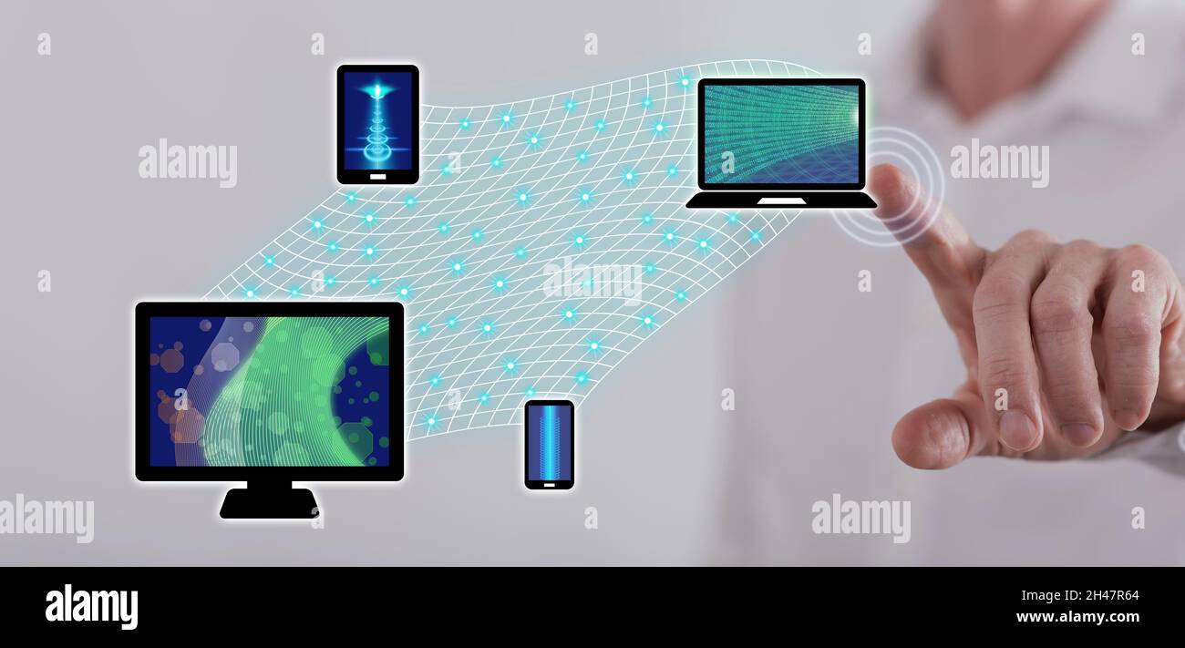 Man touching a device connection concept on a touch screen with his ...