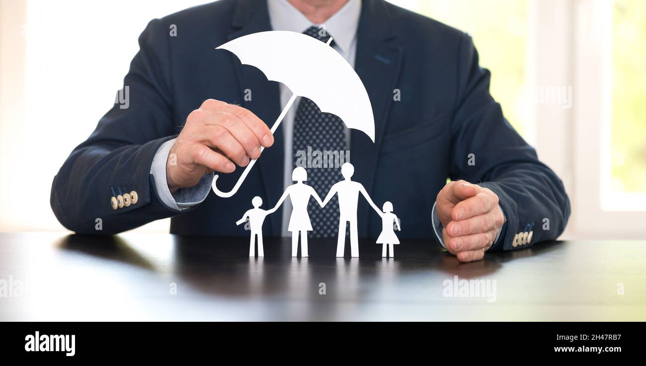 Symbol of family protection by a general agent Stock Photo - Alamy