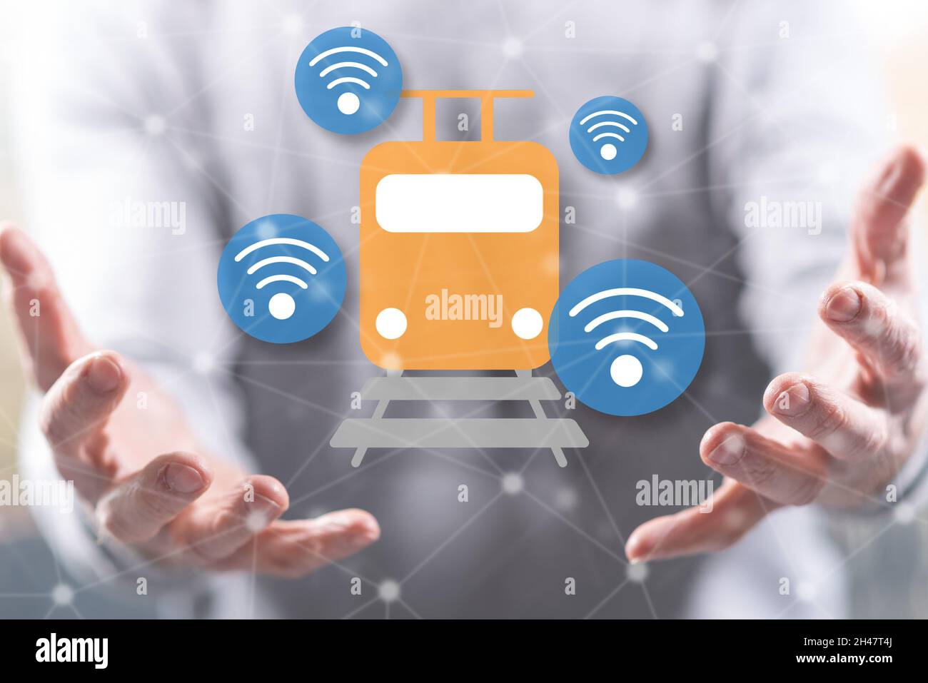 Smart train concept above the hands of a man in background Stock Photo ...