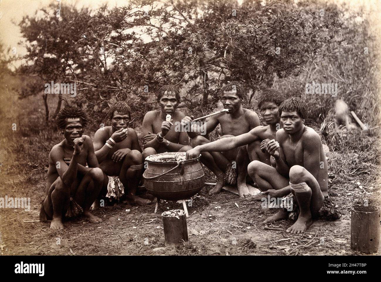 South Africa: Natal people eating. Albumen print Stock Photo - Alamy