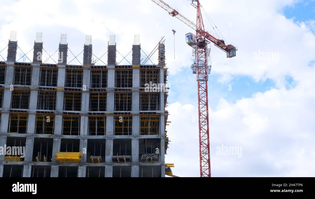 Construction site with scaffolding, a residential building under ...