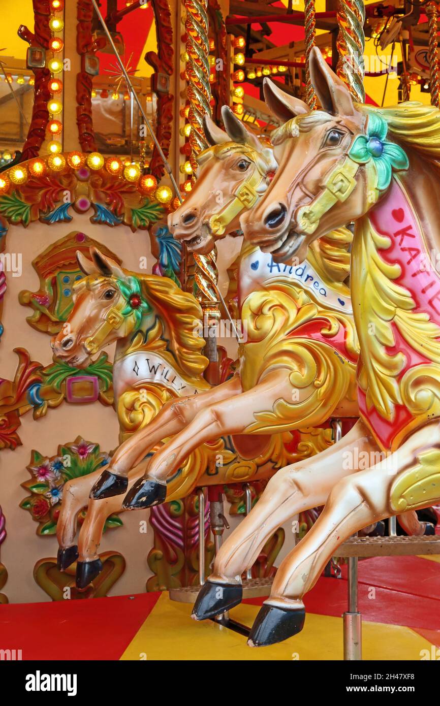 Flying Horses carousel fairground ride Stock Photo - Alamy