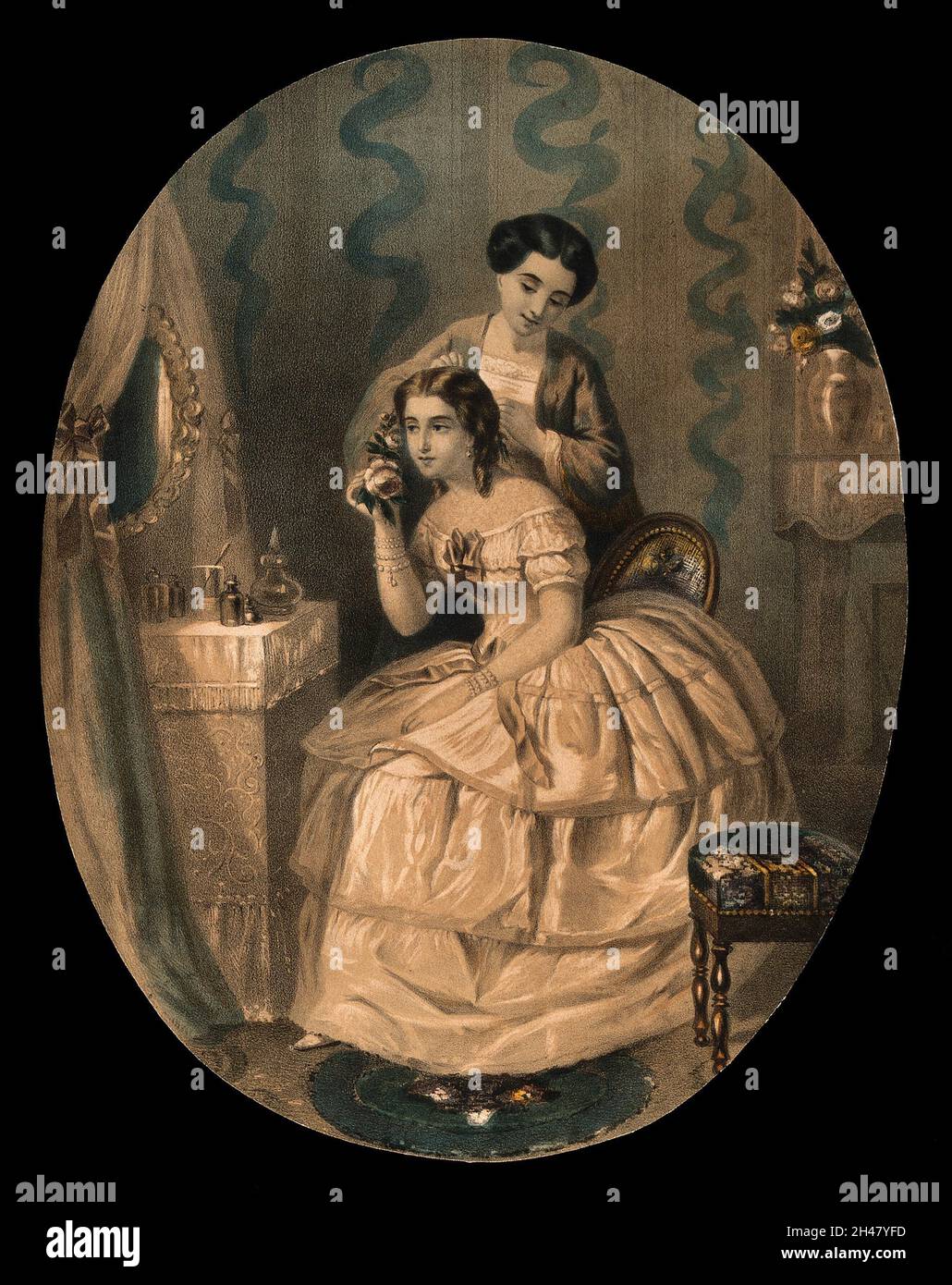 A woman at her dressing table having her hair dressed by a female ...