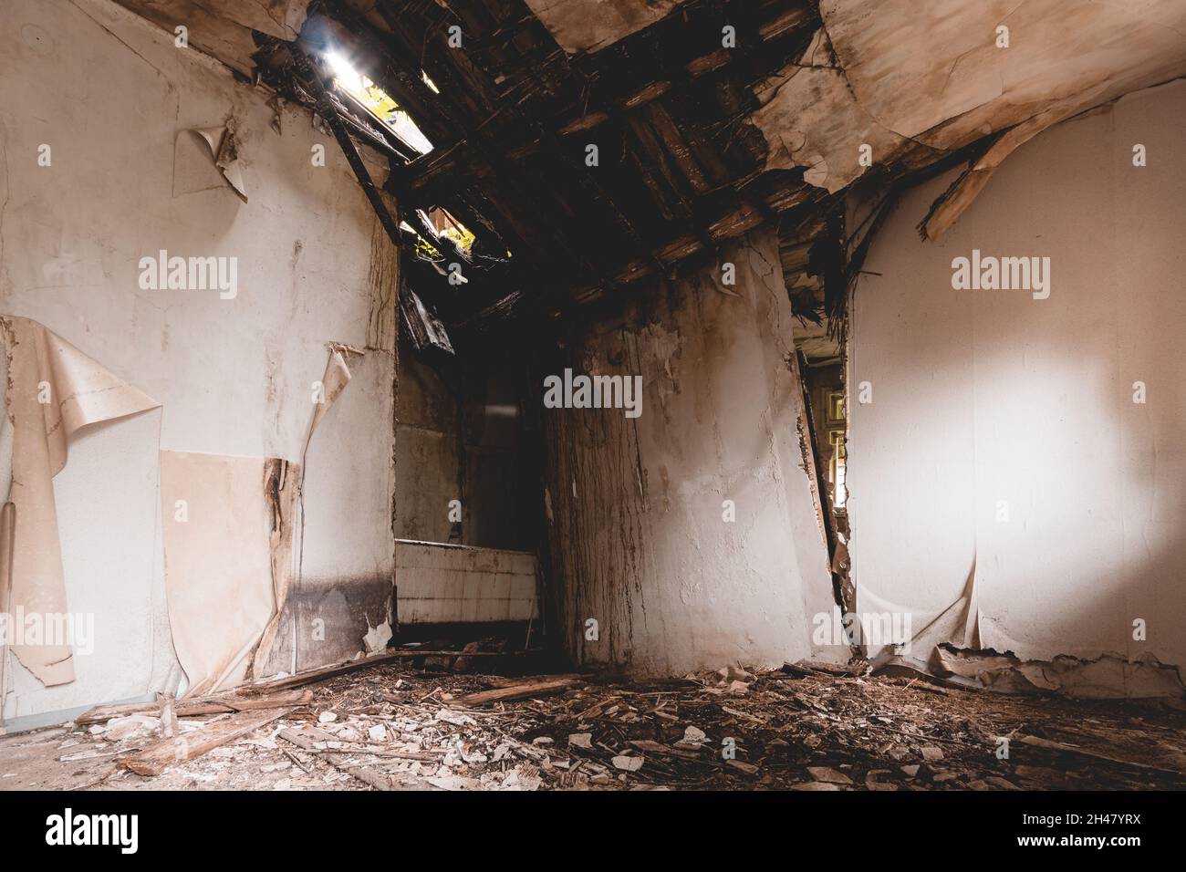 An old, collapsed hay barn, an abandoned farm, lost and decayed ...