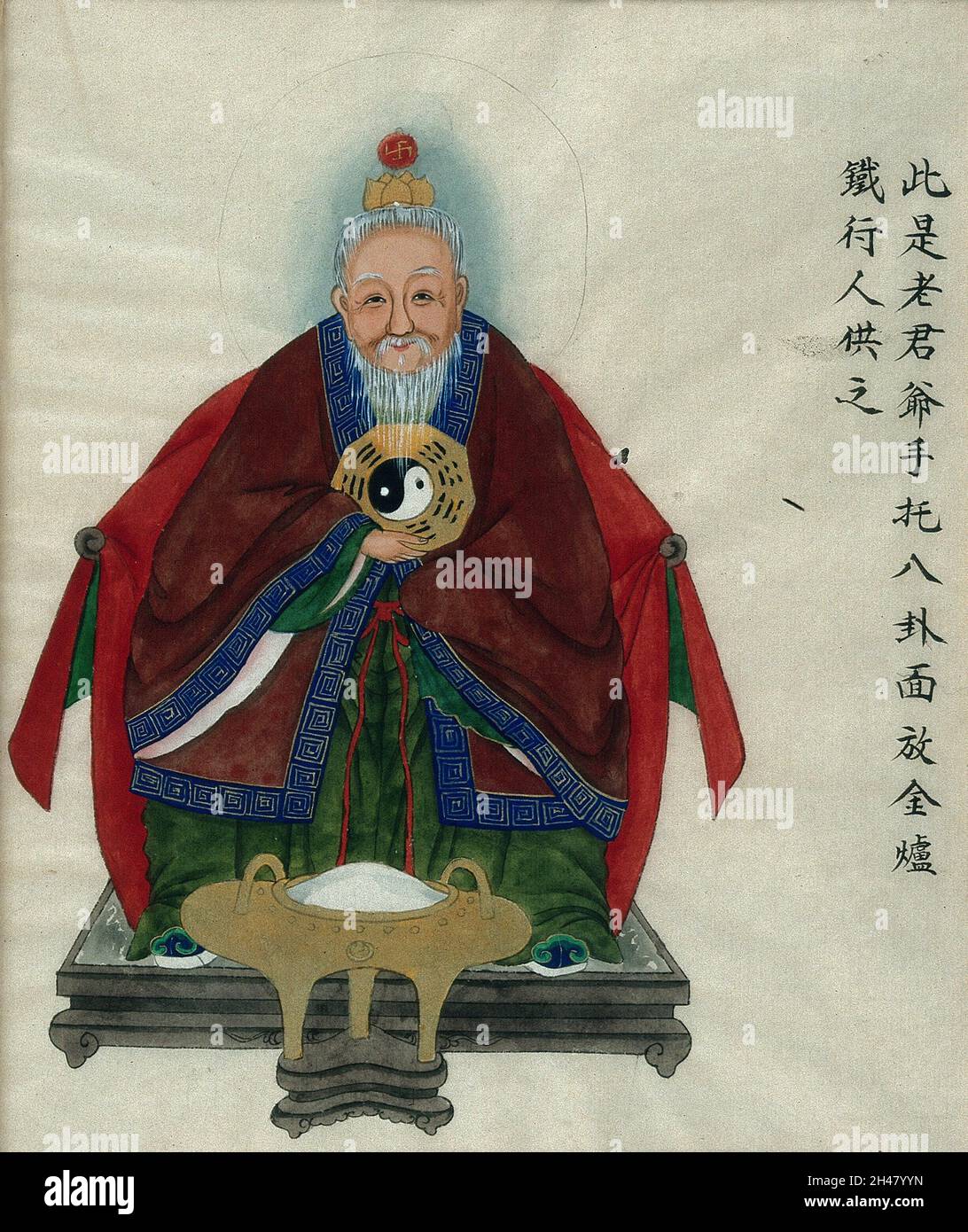 Kau Jun, the 'venerable gentleman', wearing traditional costume ...