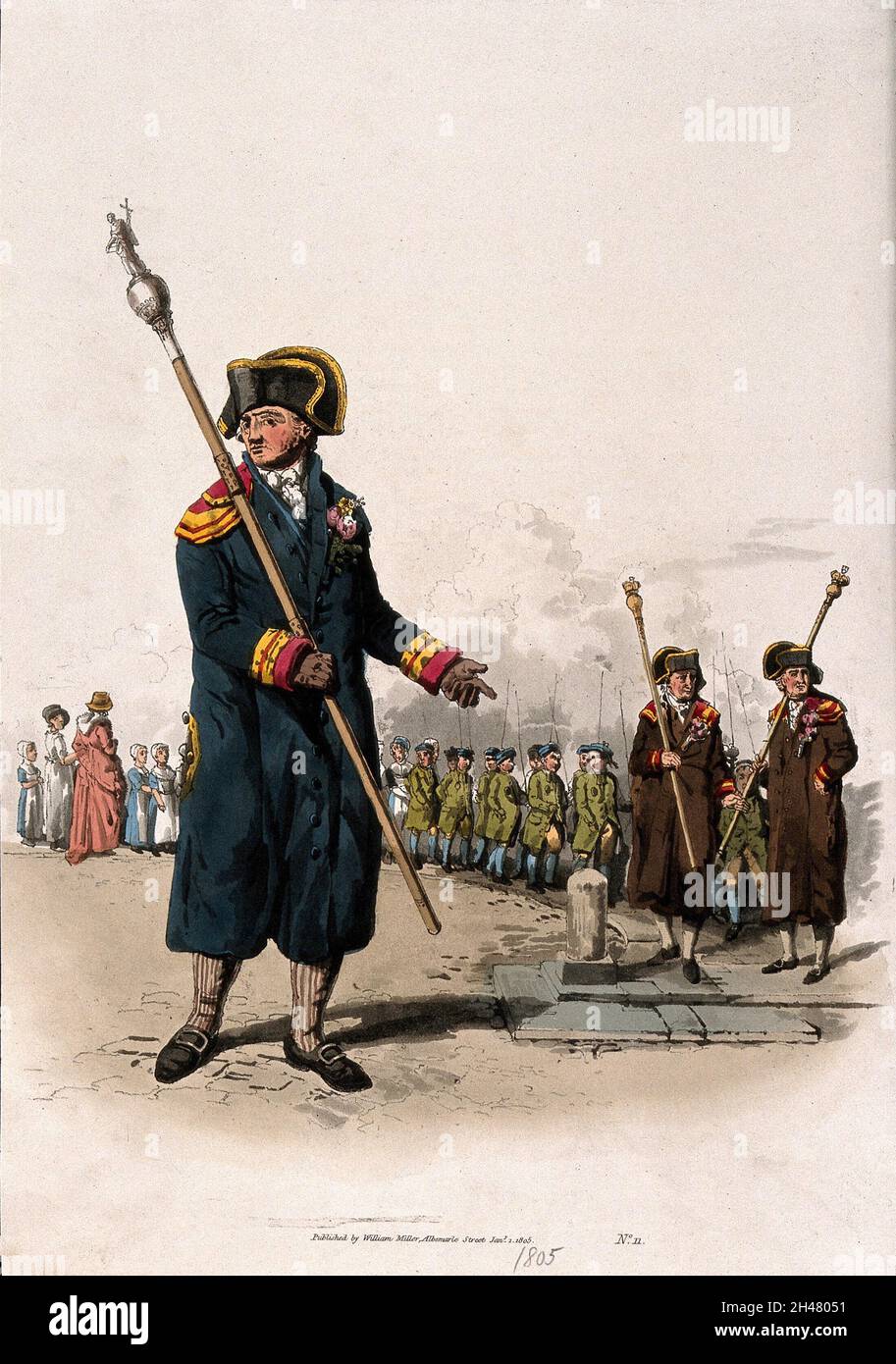 A beadle, carrying his staff: behind him two churchwardens lead a ...