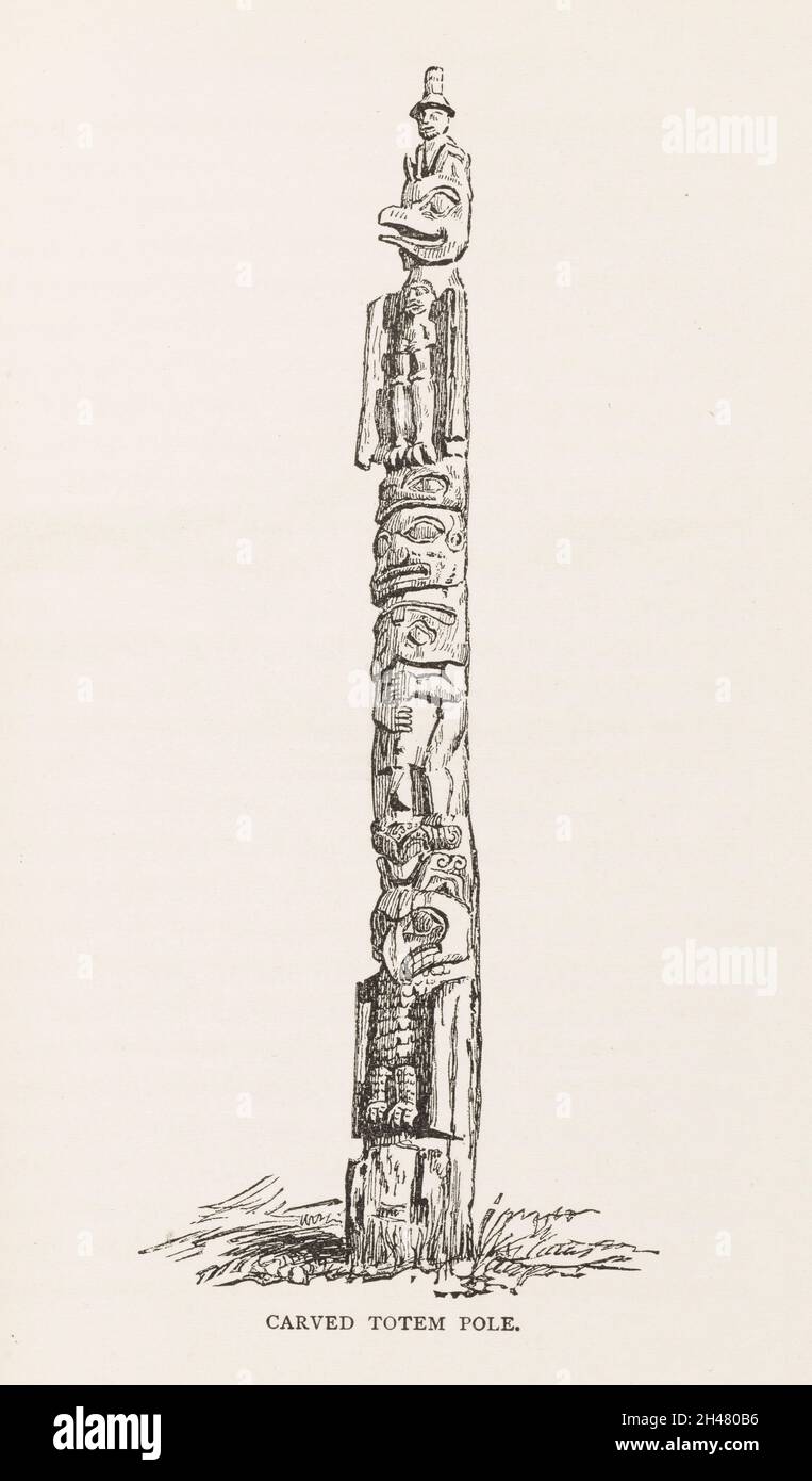 Carved totem pole Stock Photo - Alamy