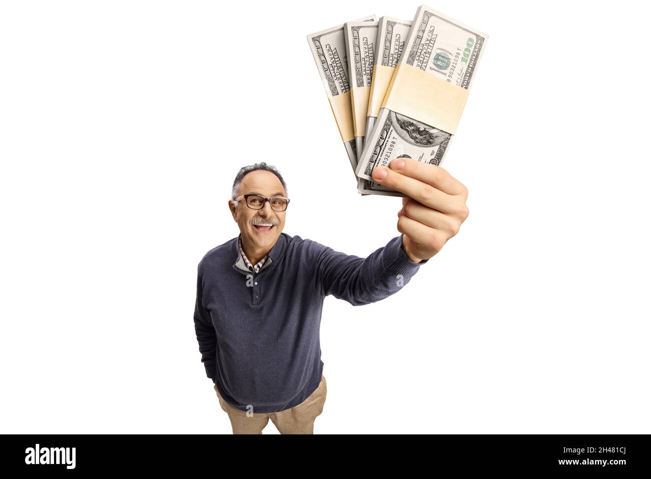 Smiling mature man showing money in front of camera isolated on white ...
