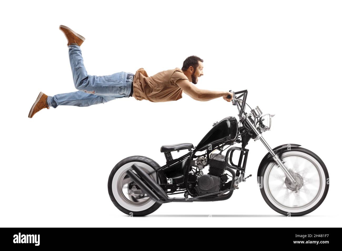 Young casual man holding onto a chopper and flying isolated on white ...
