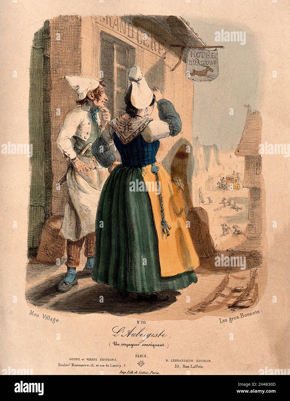 A woman inn-keeper and her cook stand outside the hotel watching the ...