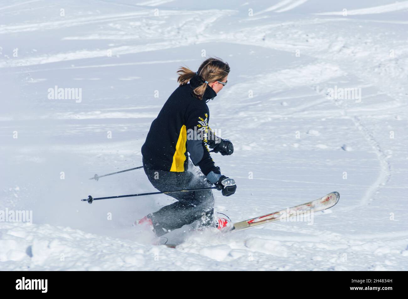 A female skier on the piste in alps hi-res stock photography and images - Alamy