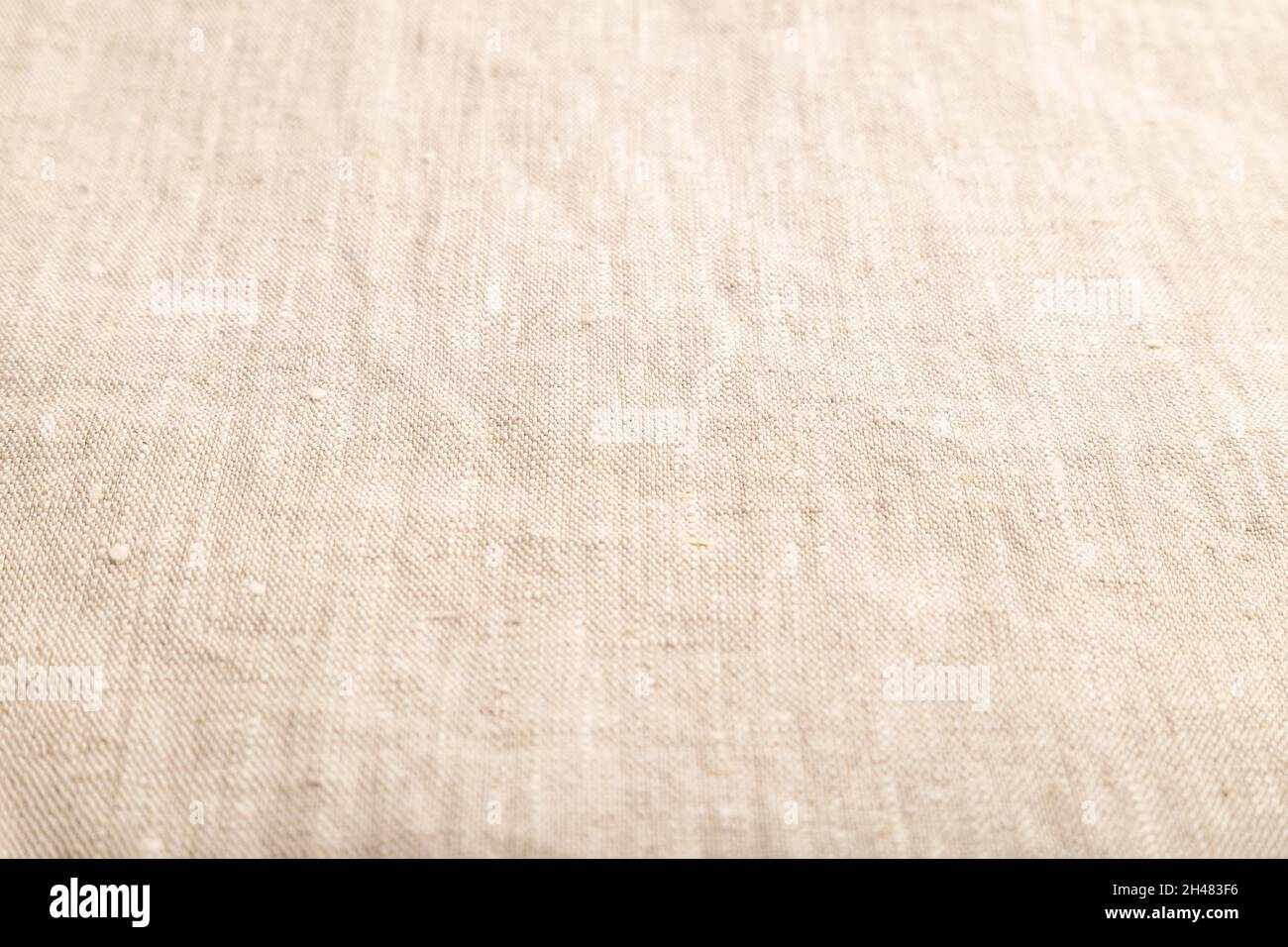Fragment of smooth white linen tissue. Side view, natural textile ...