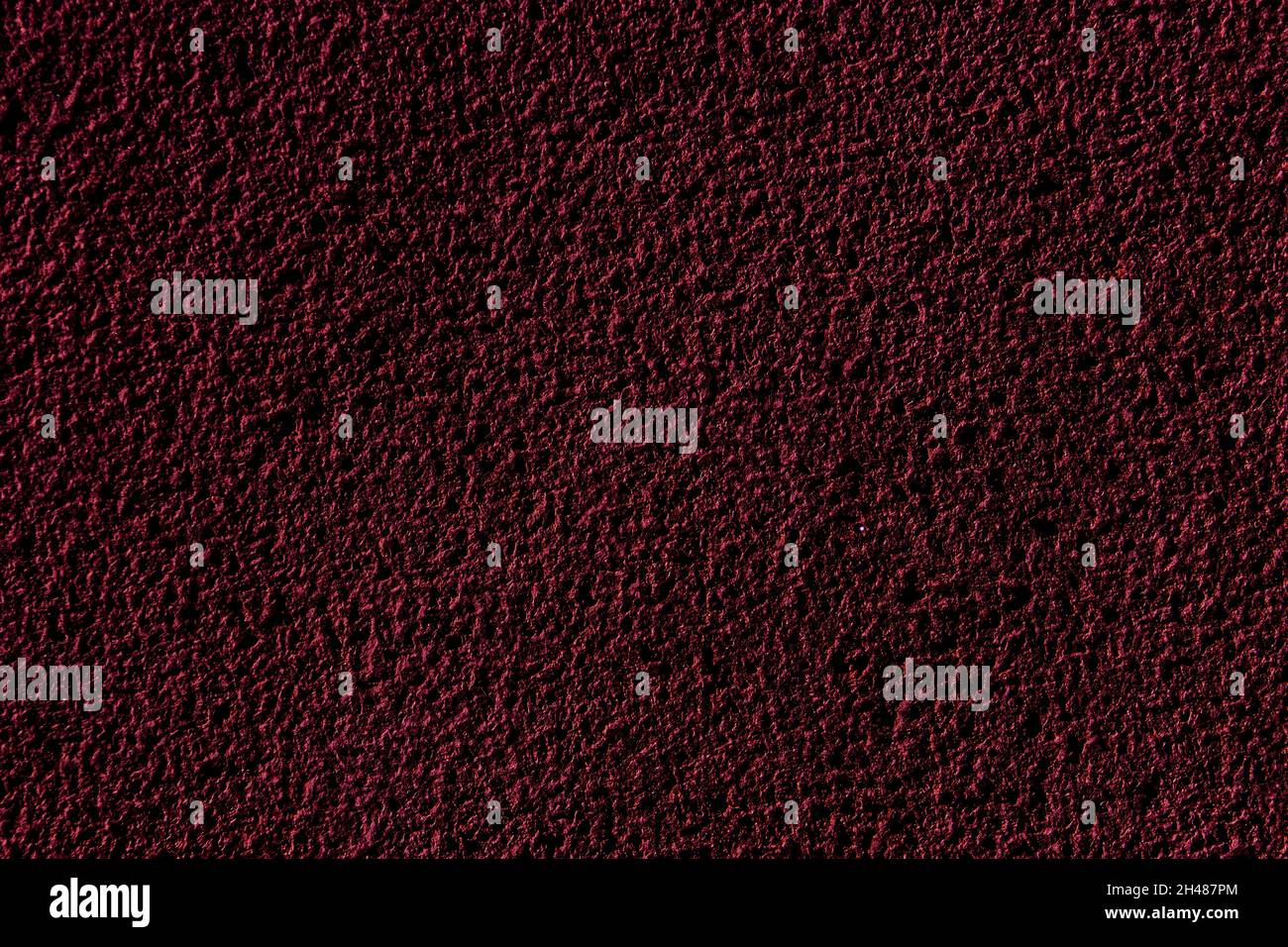 Crimson colored wall background with textures of different shades of ...