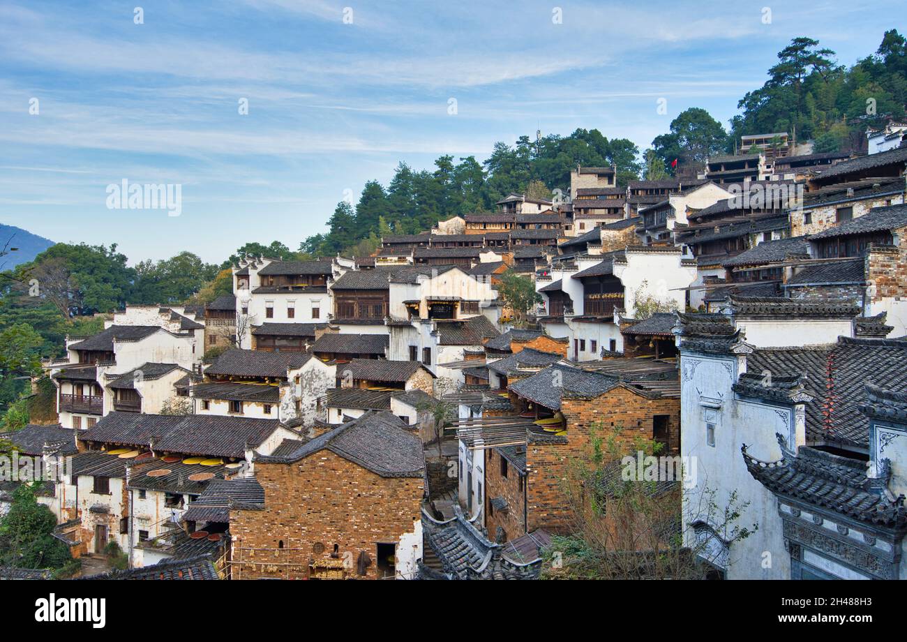Gray roofs with white or brown walls. Ancient buildings in Huangling ...