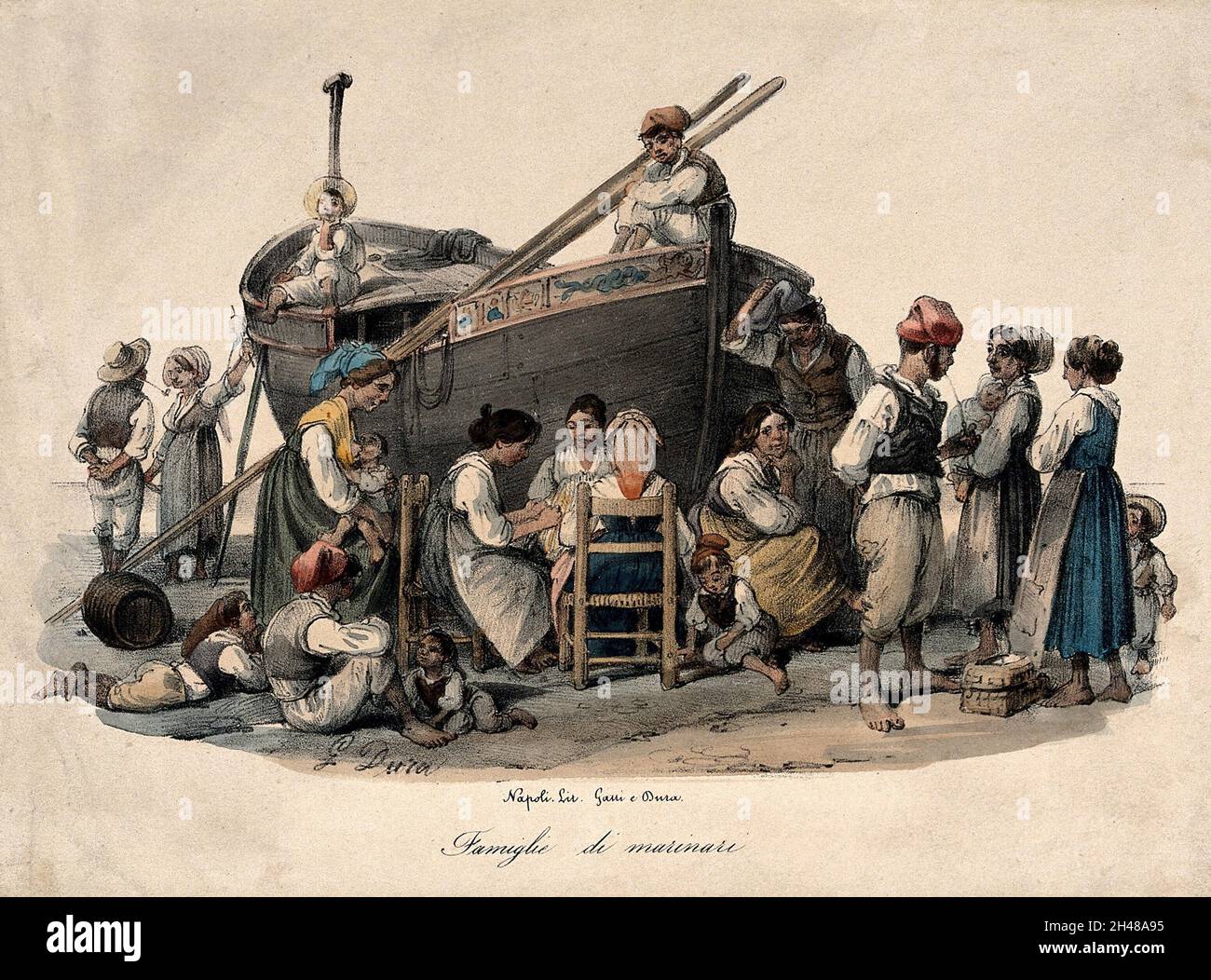 A large family of fisher folk in Naples are gathered together around a ...