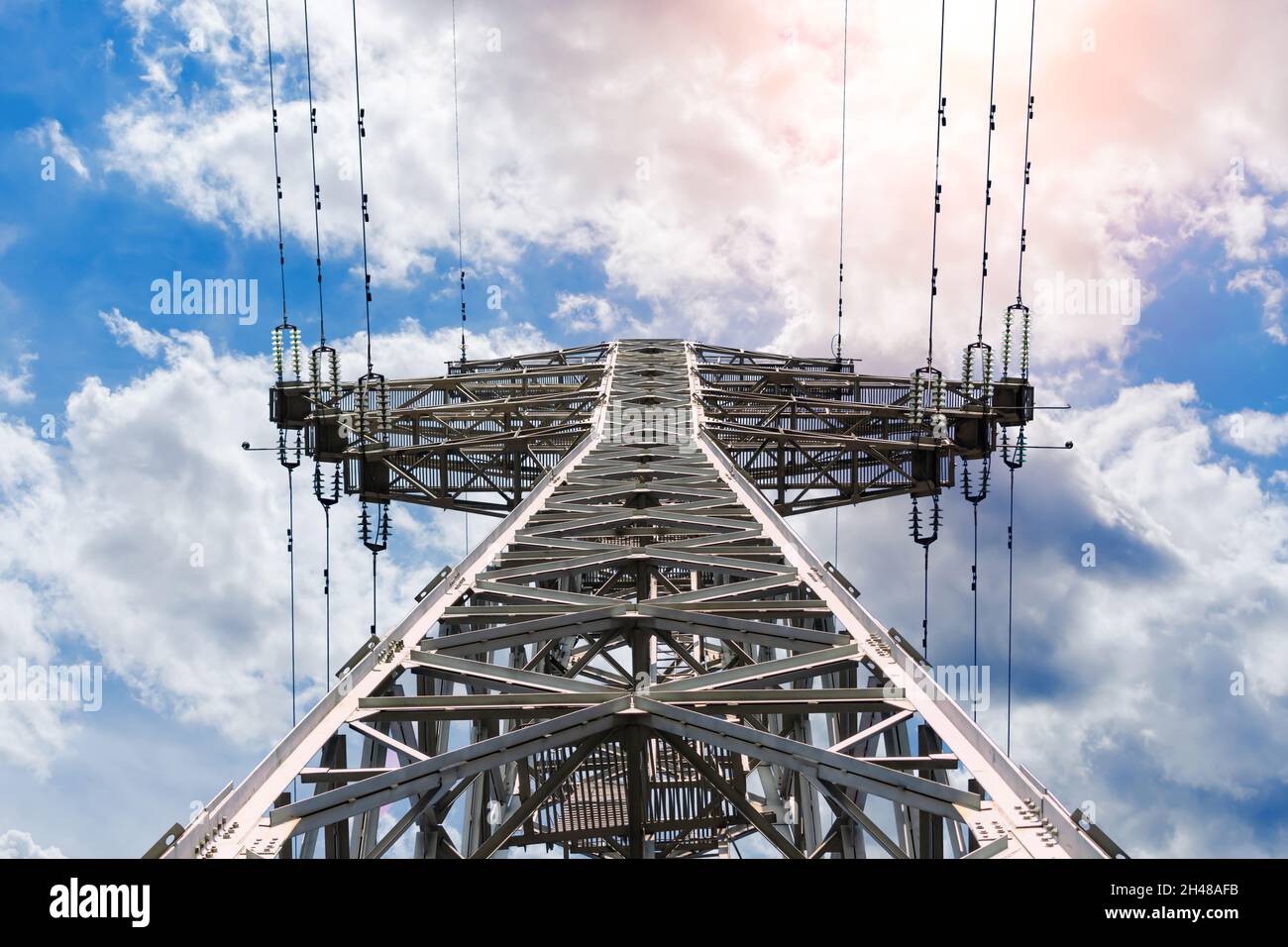 A tall electric tower that distributes energy to cities against the ...